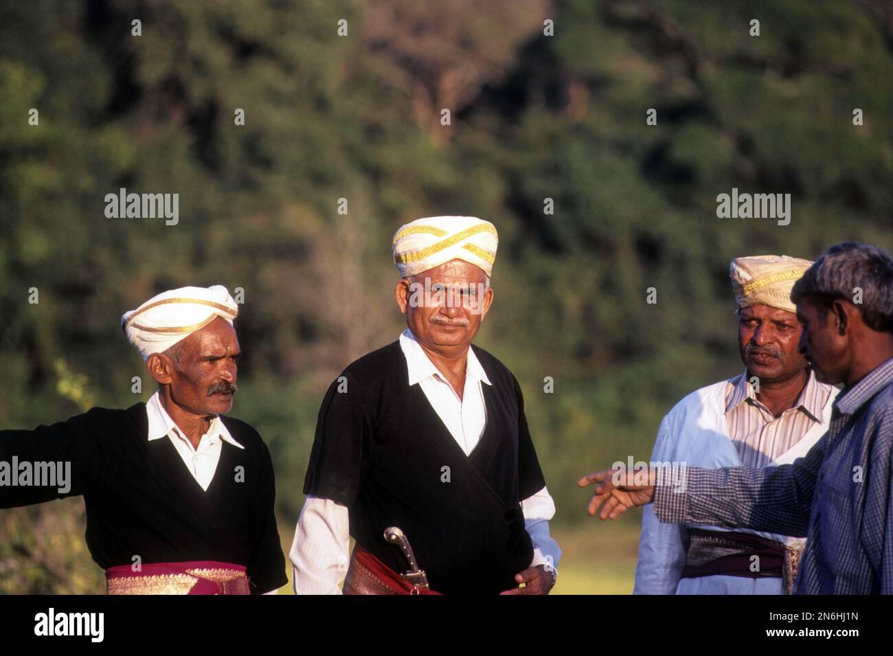 Kodavas in their traditional dress at Madikeri, Mercara in Kodagu ...