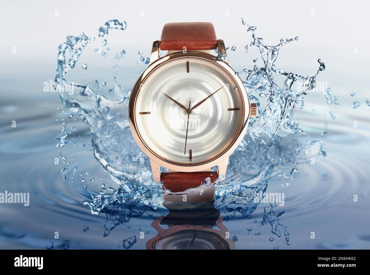 Luxury men's watch in water splashes demonstrating its waterproof Stock ...