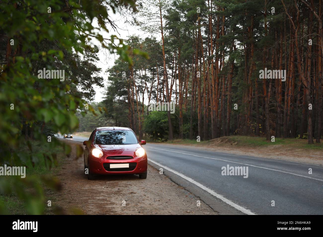 Red classic car sunset hi-res stock photography and images - Alamy
