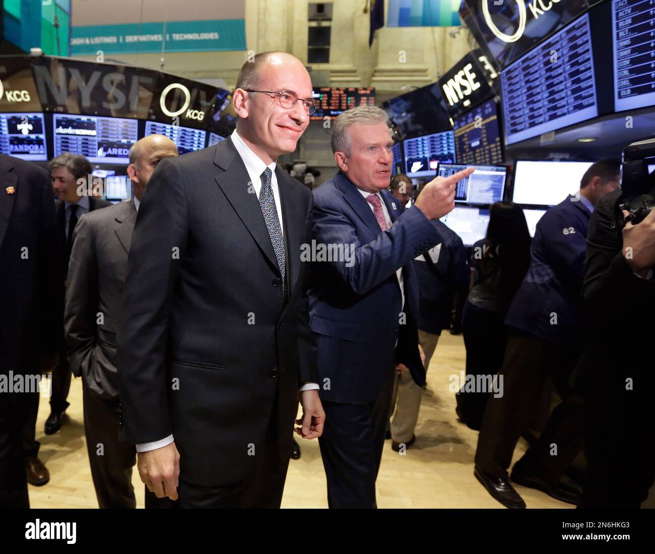 Italian Prime Minister Enrico Letta, left, tours the NYSE trading floor ...