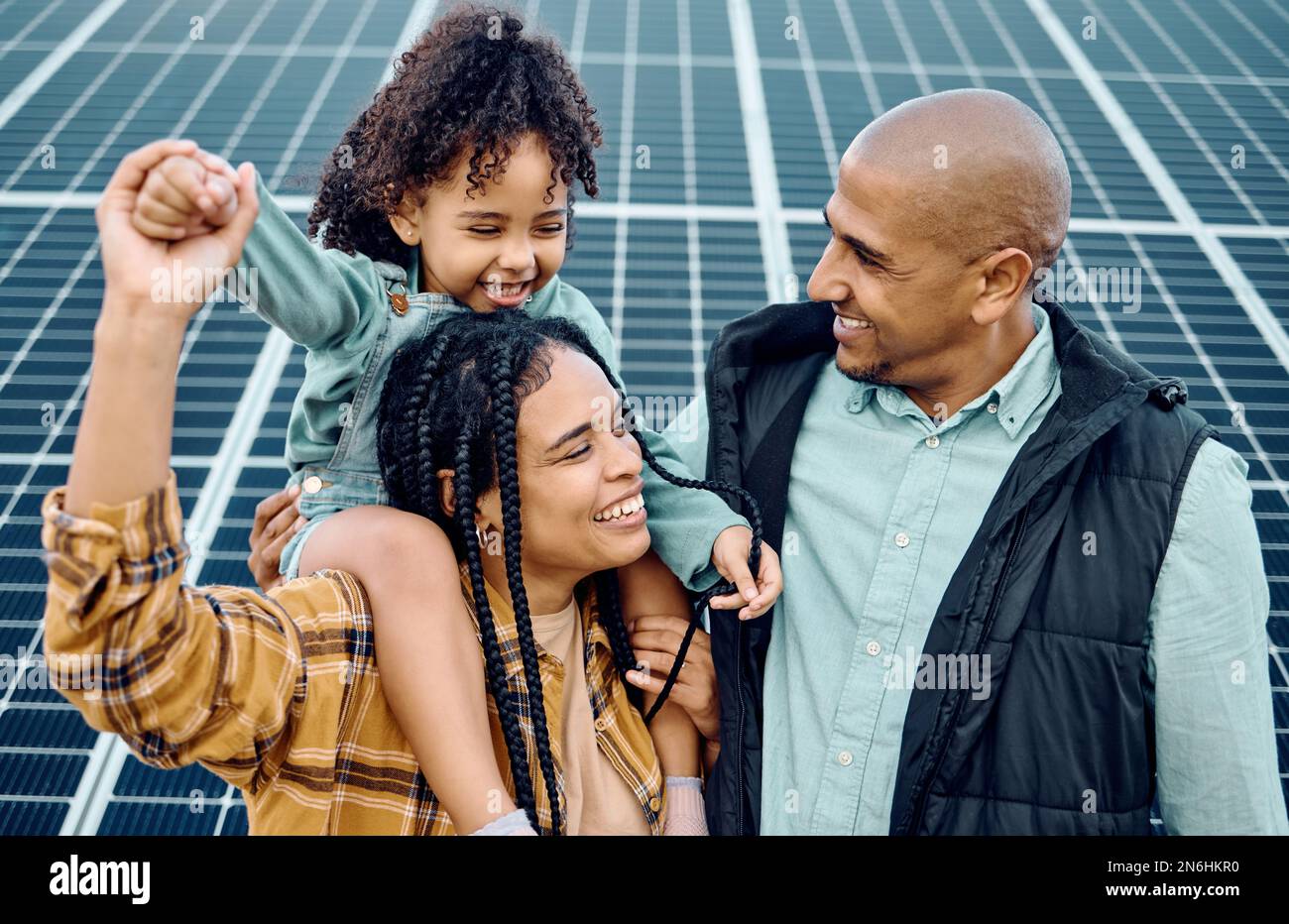 Black family, children or solar panel with a mother, father and ...
