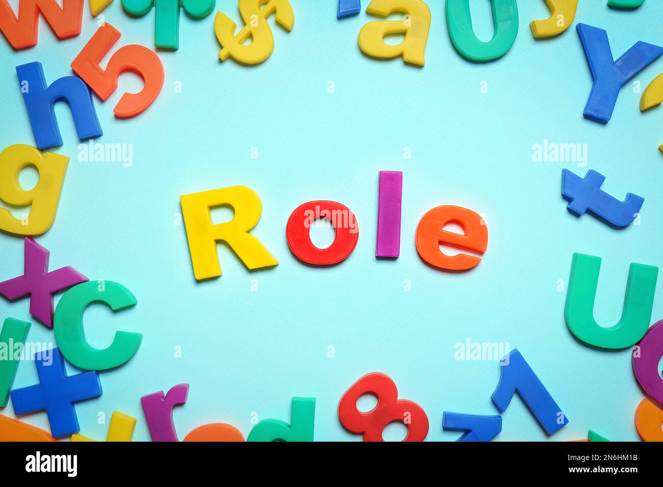 Word Role made of plastic letters on light blue background, flat lay ...