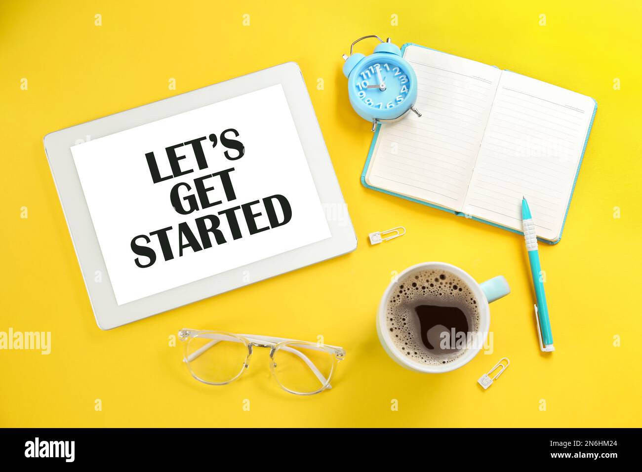 Let's Get Started. Flat lay composition with tablet and stationery on ...