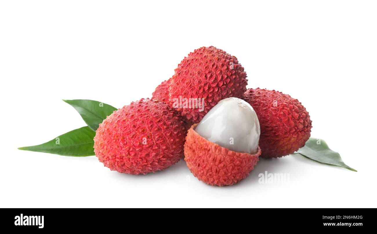 Pile of fresh ripe lychees with green leaves on white background Stock ...