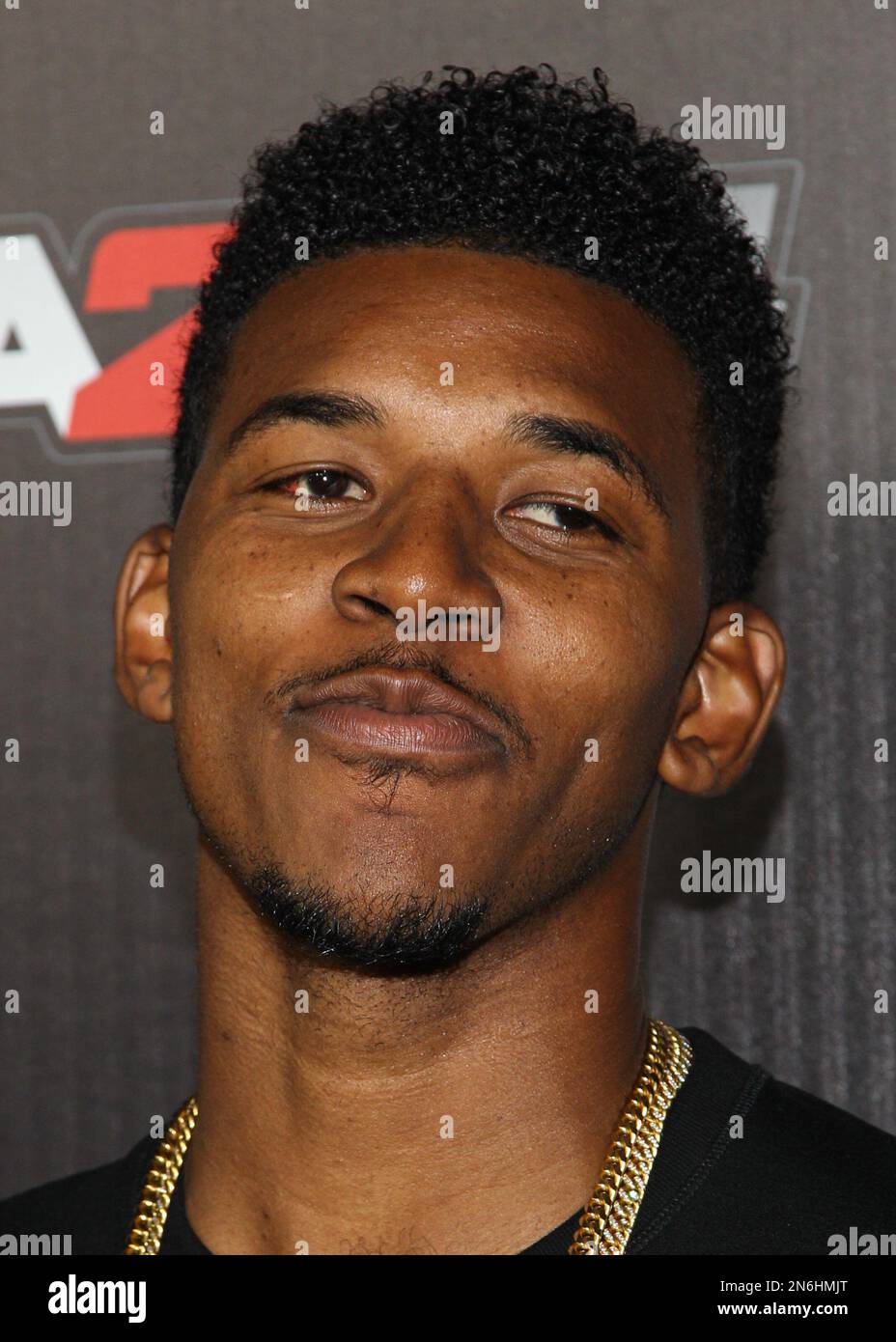 Basketball player Nick Young arrives at the premiere of "NBA 2K14 ...