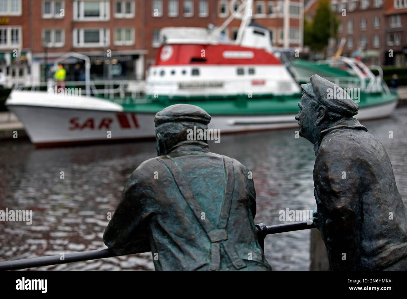 Bronze statues of dolphin spitters at the Ratsdelft, artist Hans ...