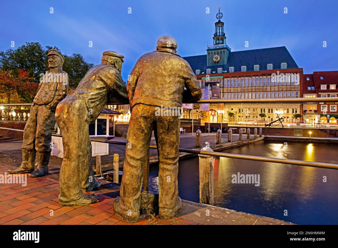 Bronze statues of dolphin spitters on the Ratsdelft in front of the ...