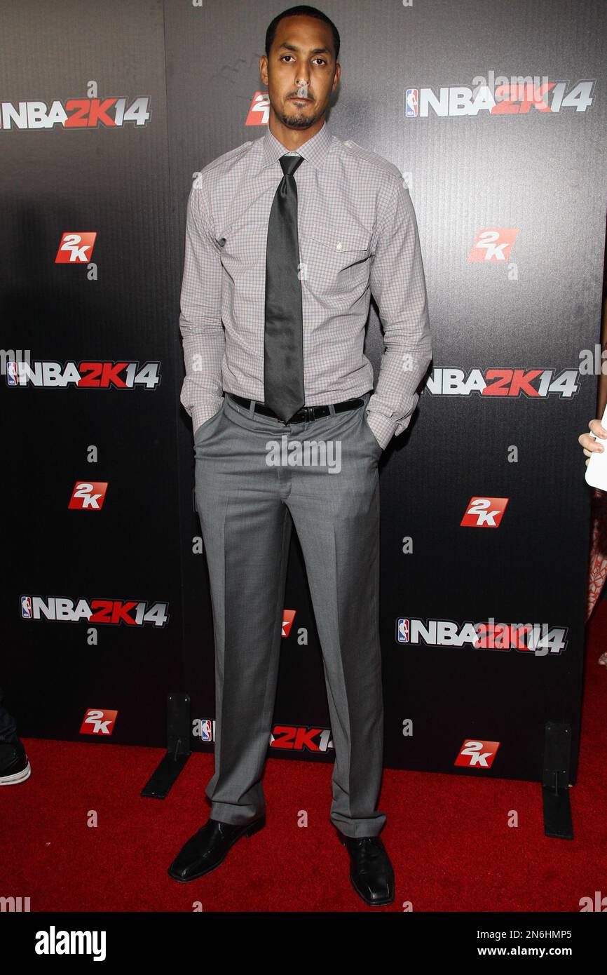 Basketball player Ryan Hollins arrives at the premiere of "NBA 2K14 ...
