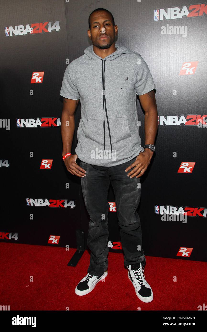 Basketball player Andre Iguodala arrives at the premiere of "NBA 2K14 ...