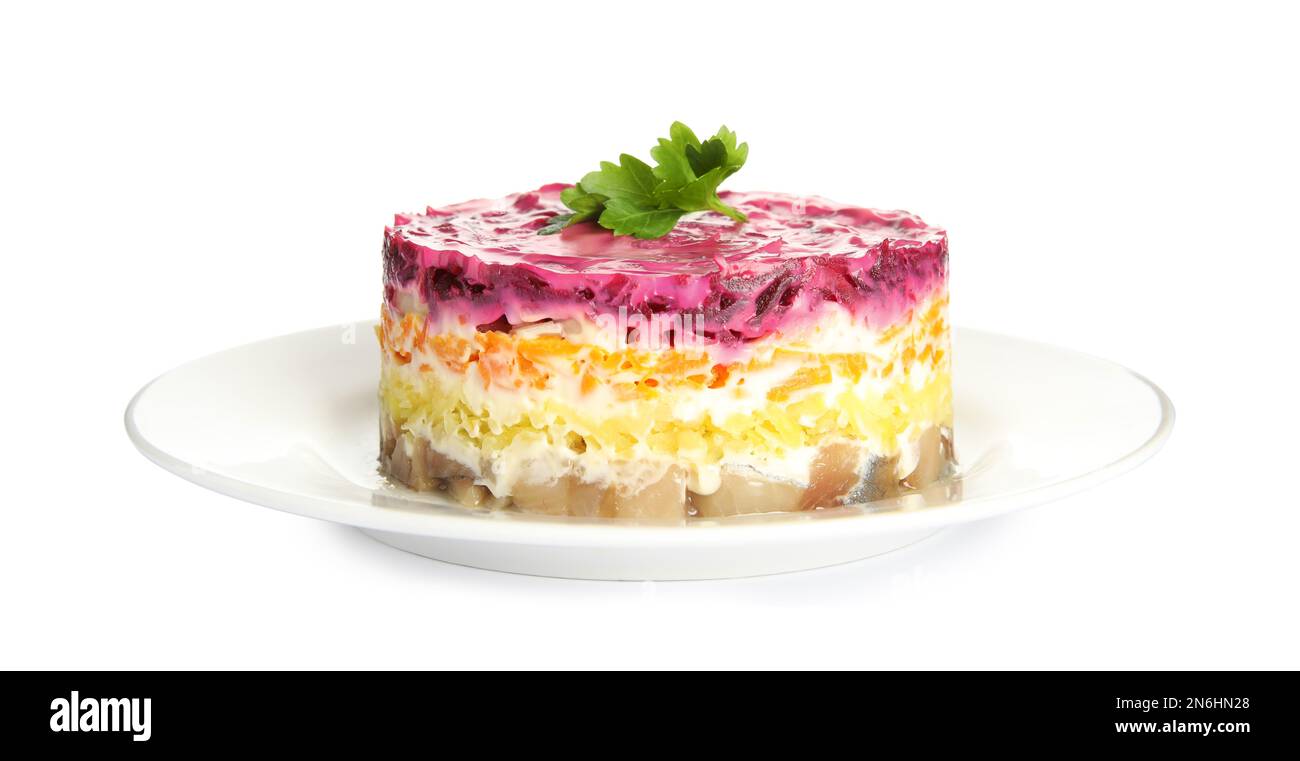 Herring under fur coat isolated on white. Traditional russian salad ...