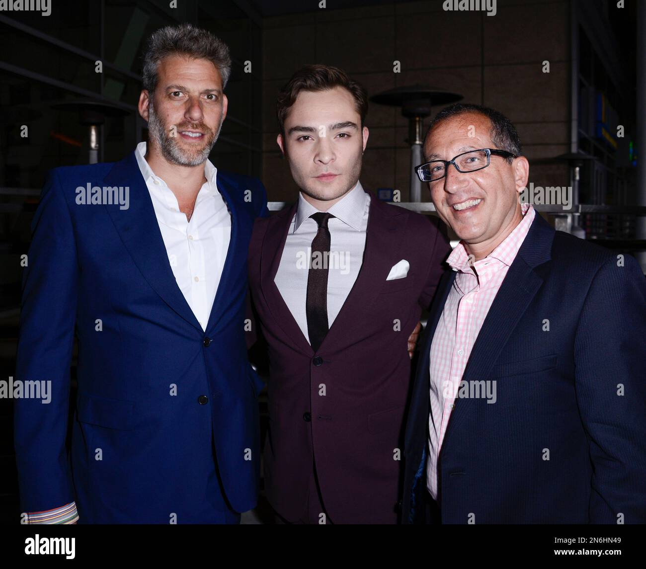 From left to right, producer Lawrence Elman, actor Ed Westwick, and ...