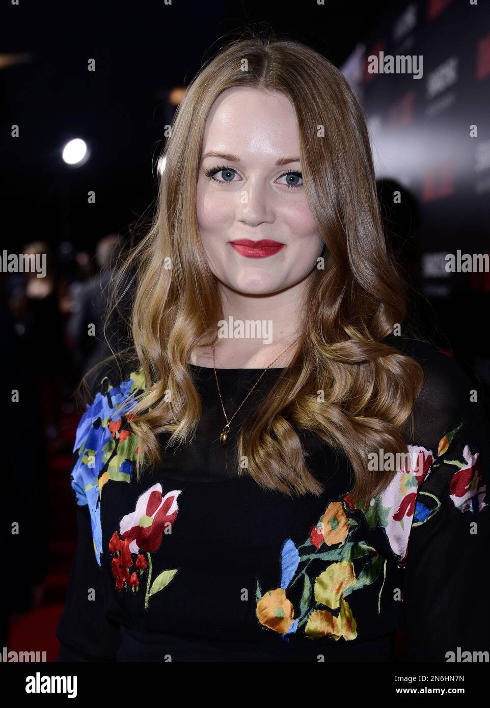 Actress Cara Theobold arrives on the red carpet at the premiere of the ...