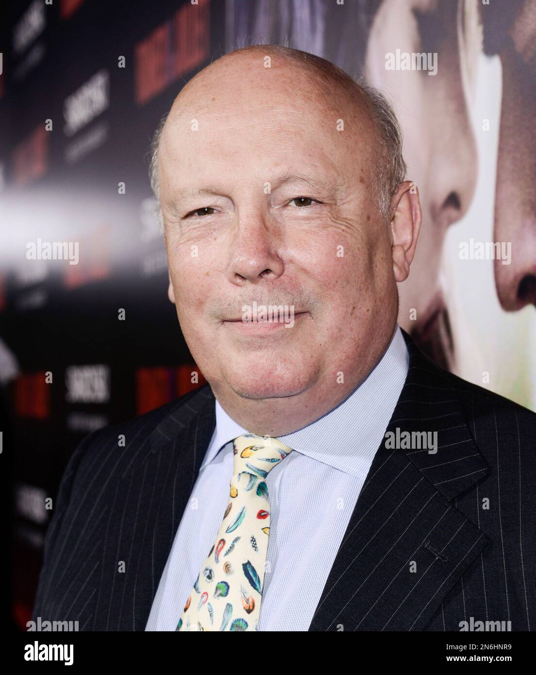 Writer Julian Fellowes arrives on the red carpet at the premiere of the ...