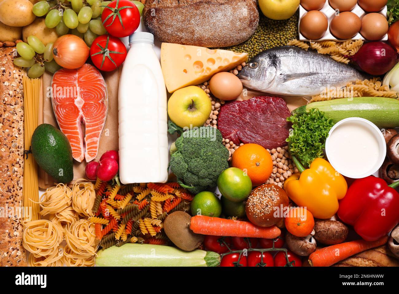 Different products as background, top view. Healthy food and balanced ...