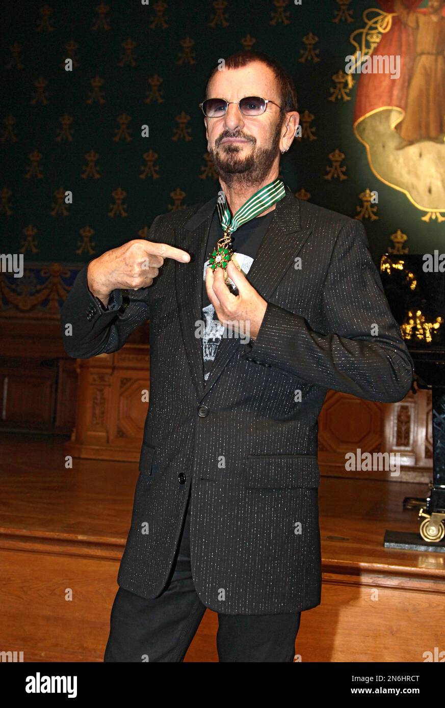 English musician, singer, songwriter and actor, Ringo Starr poses with ...