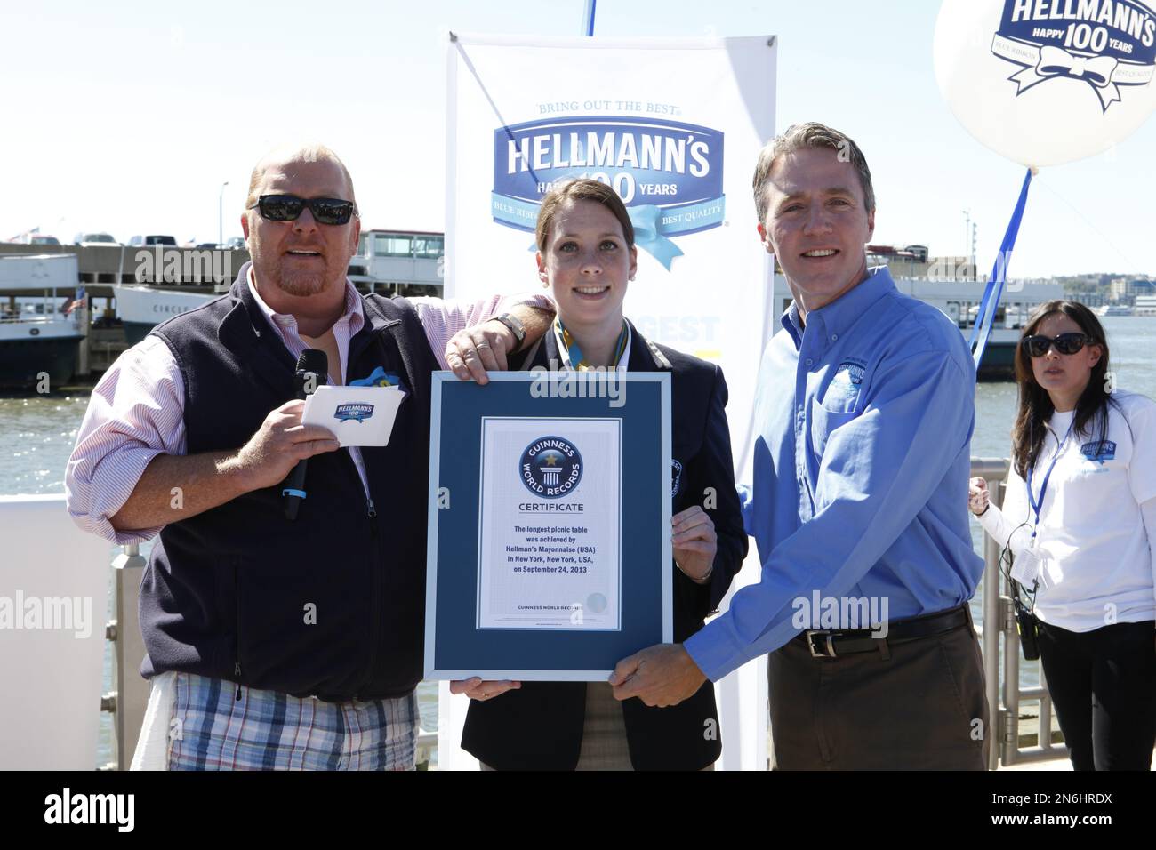Mario Batali and Jonathan Atwood presents Sara Wilcox with the Guinness ...
