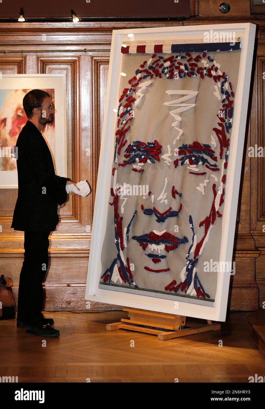 English musician, singer, songwriter and actor, Ringo Starr looks at a ...