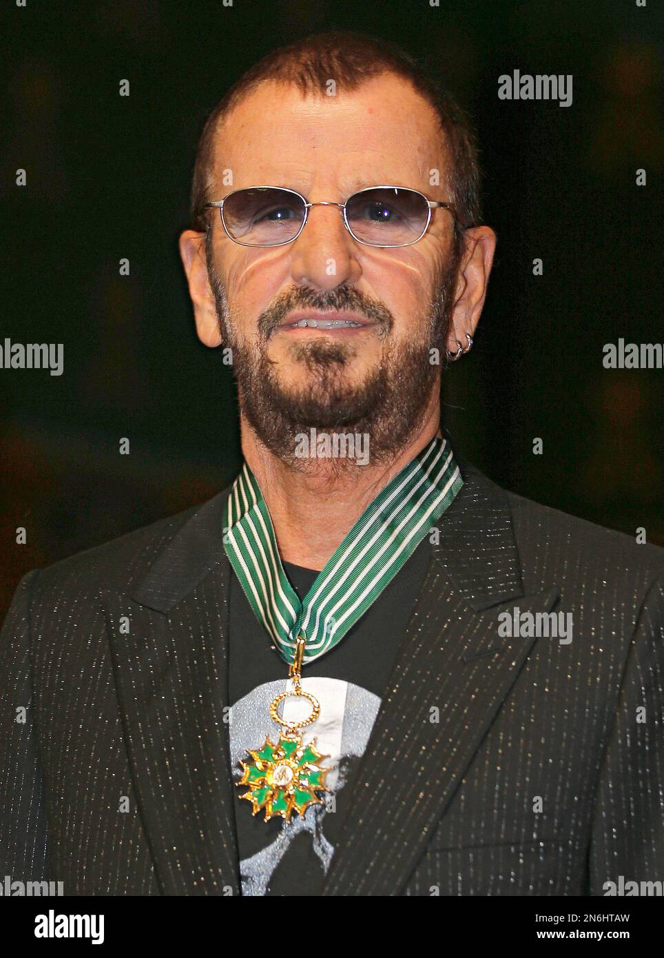 English musician, singer, songwriter and actor, Ringo Starr poses with ...