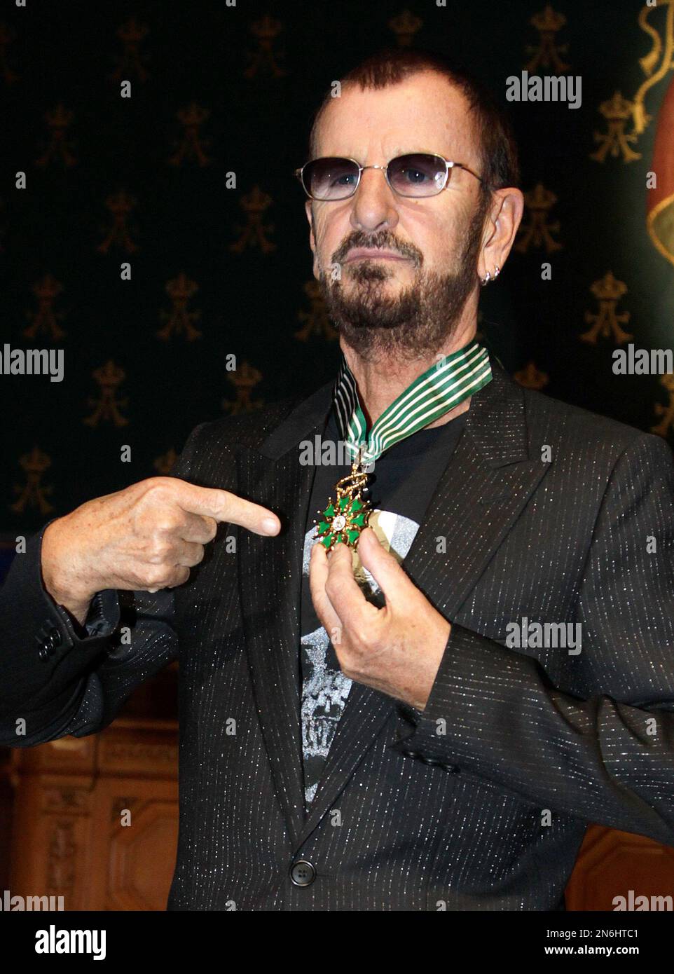 English musician, singer, songwriter and actor, Ringo Starr poses with ...