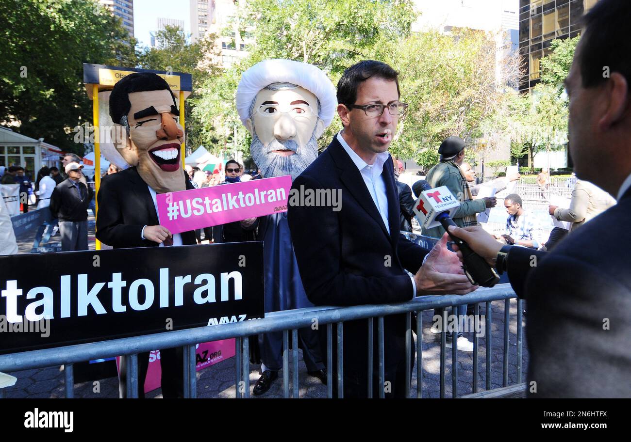 Ian Bassin, campaign director for Avaaz, speaks to the news media as ...