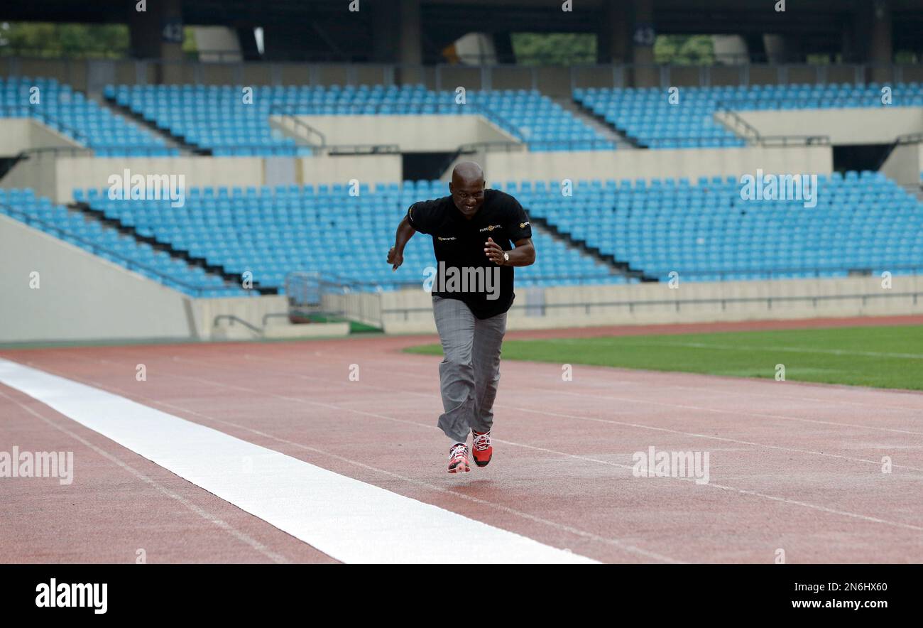 Canada's former sprinter Ben Johnson runs along a 100-meter-long ...