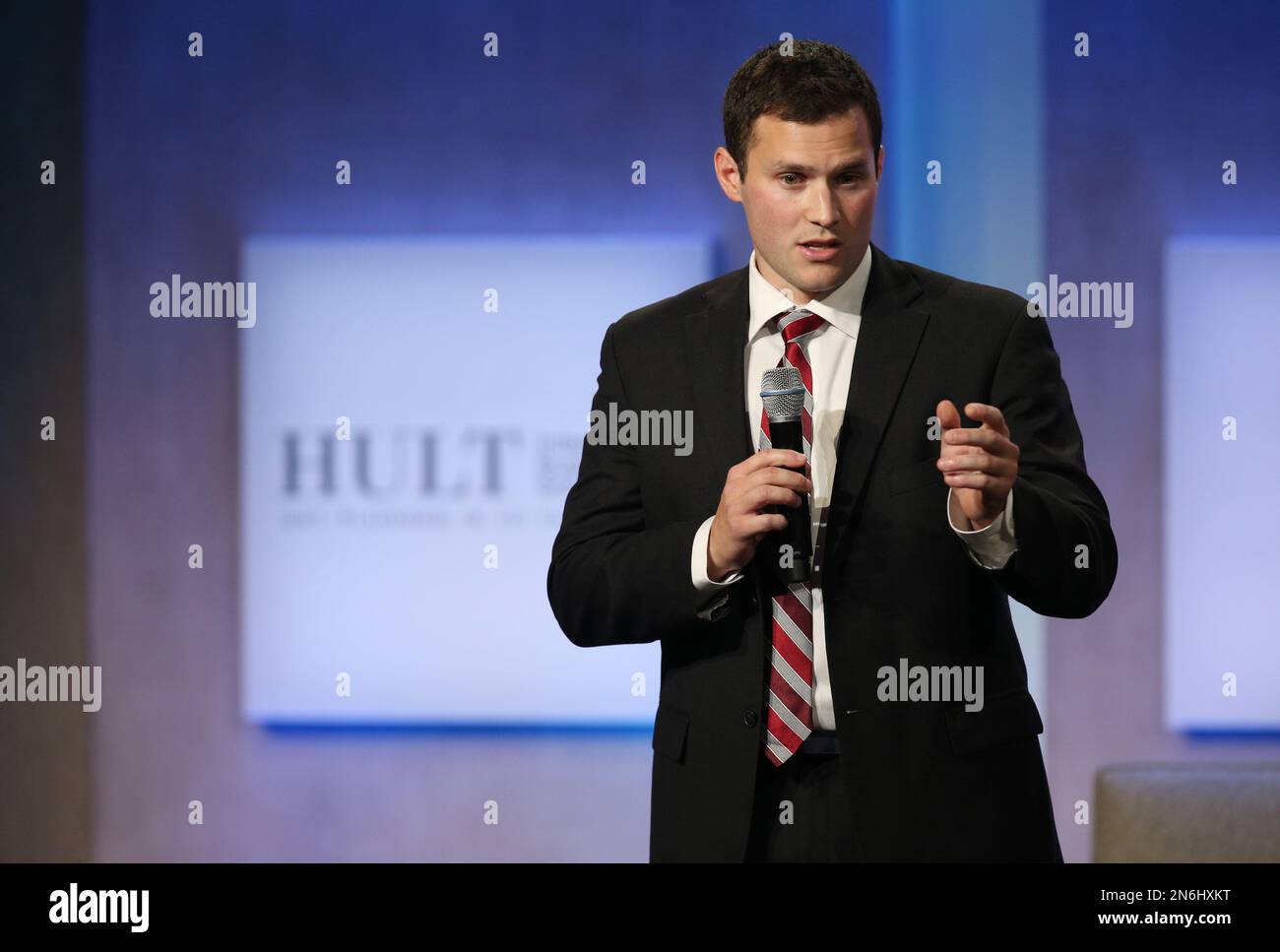 The winning team, McGill University, speak on stage during The Hult ...