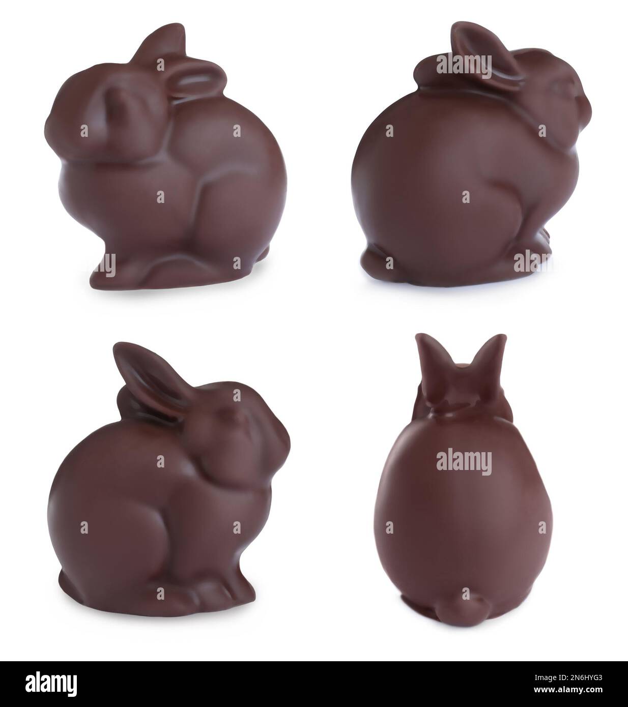 Set with chocolate Easter bunnies on white background Stock Photo - Alamy