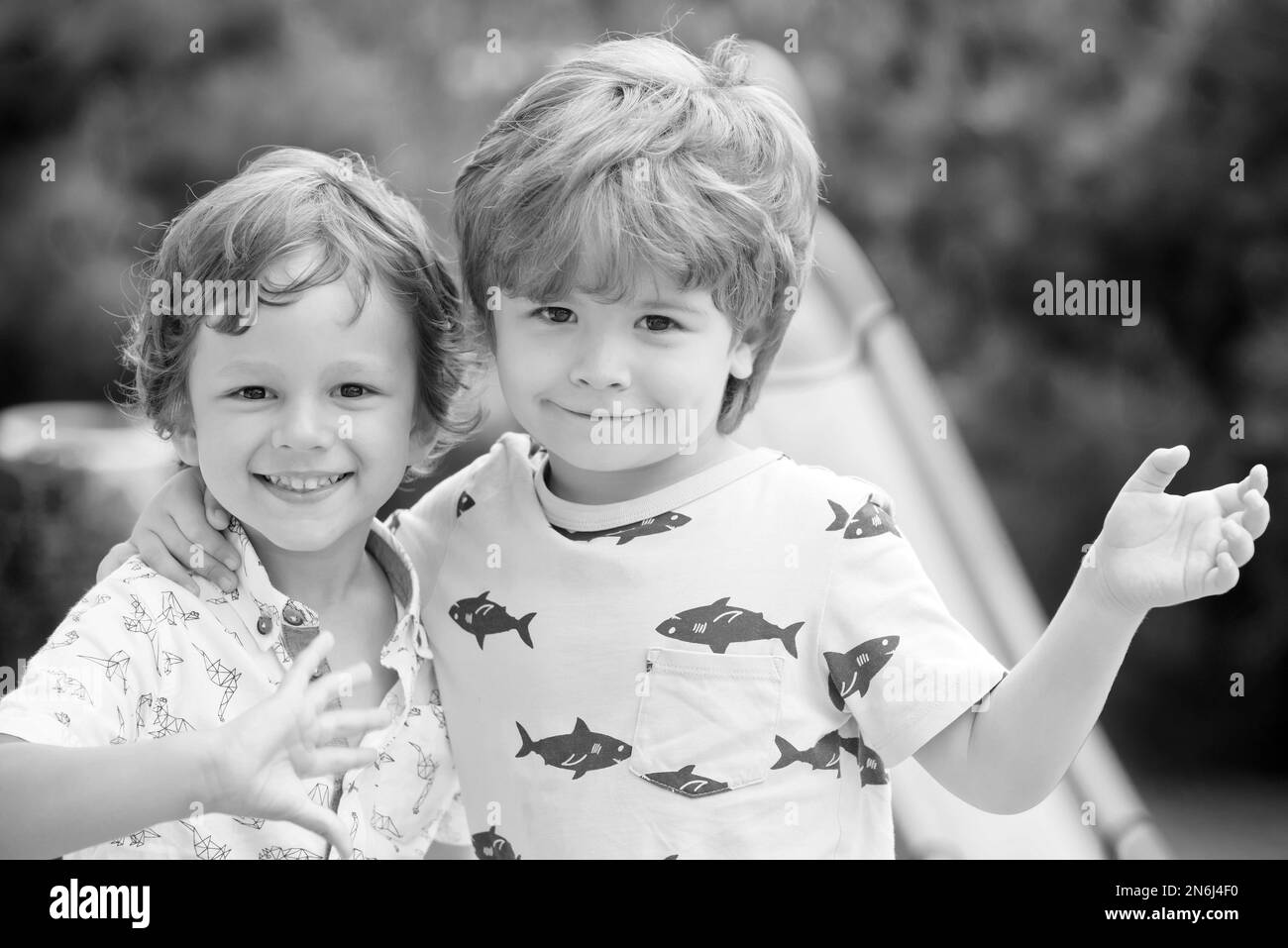 Happy brothers outdoor. Children on playground, best friends. Kids ...