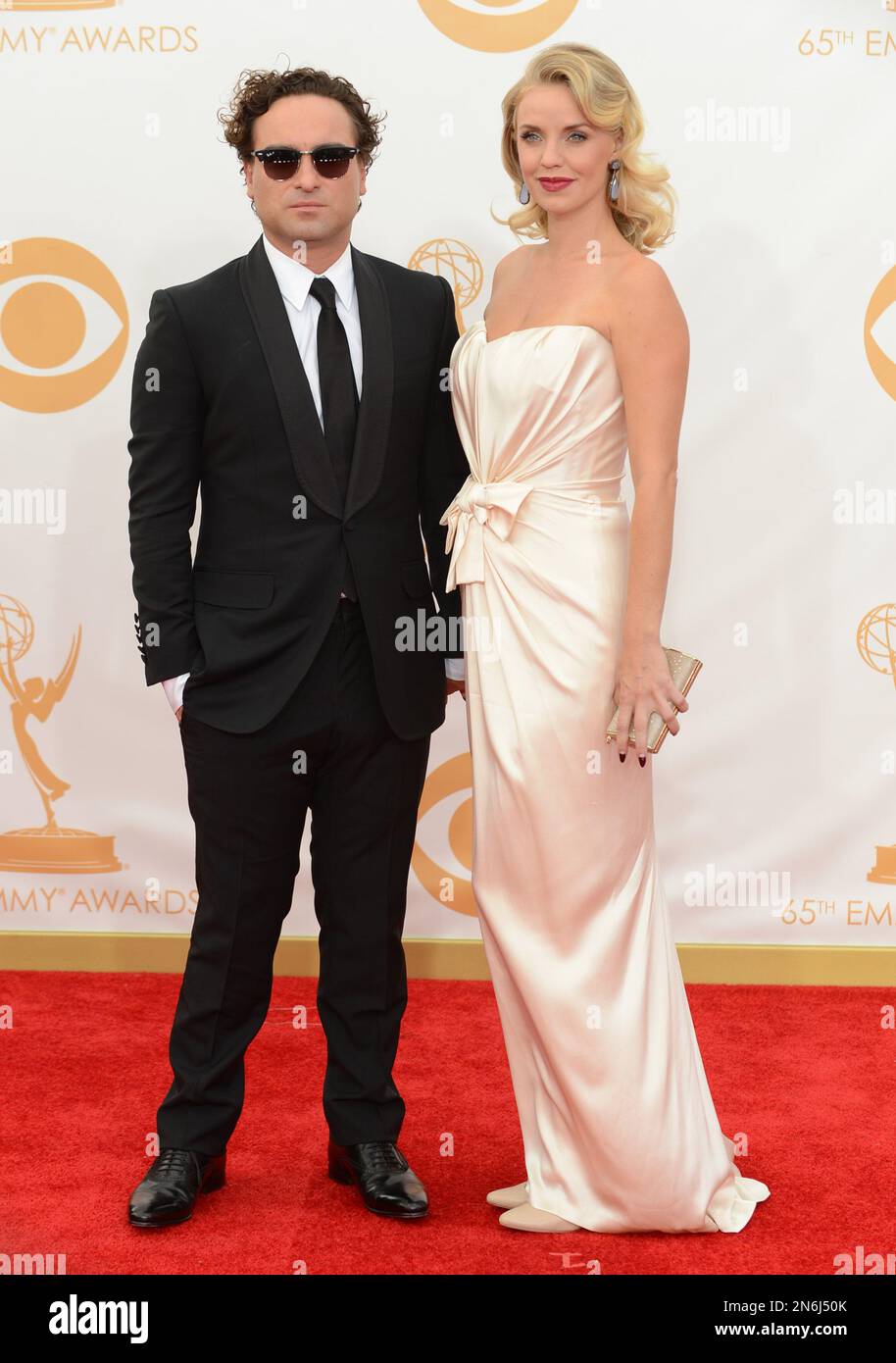 Johnny Galecki, left, and Kelli Garner arrive at the 65th Primetime ...