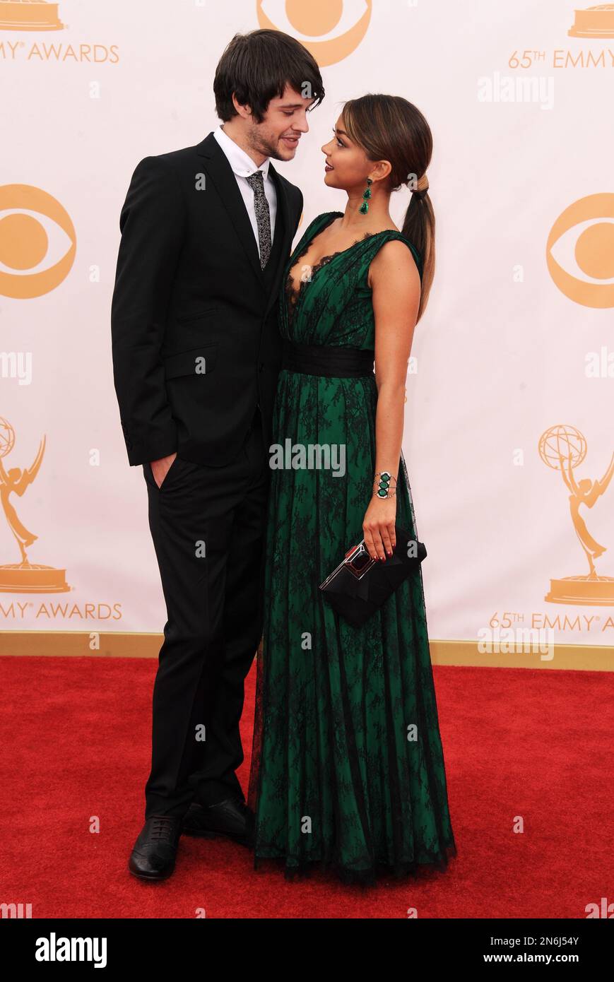 Matt Prokop, left, and Sarah Hyland arrive at the 65th Primetime Emmy ...