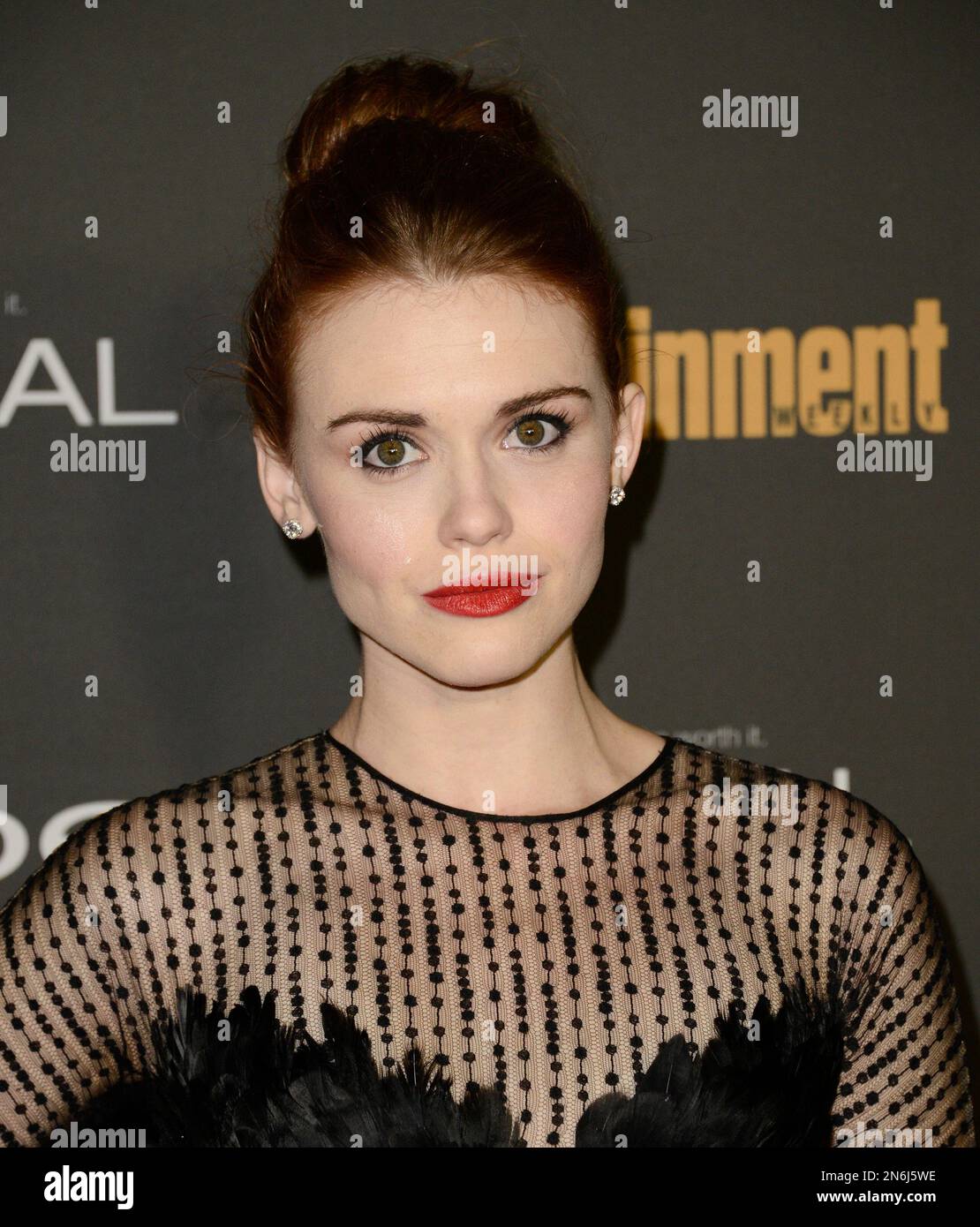 Actress Holland Roden arrives at the 2013 Entertainment Weekly Pre-Emmy ...