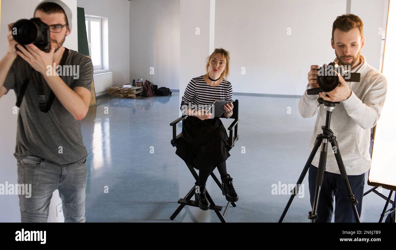 Creative team working in studio Stock Photo - Alamy