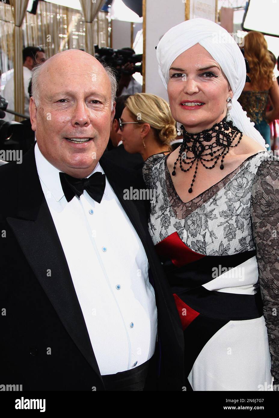 From left, Julian Fellowes and Emma Kitchener-Fellowes arrive at the ...