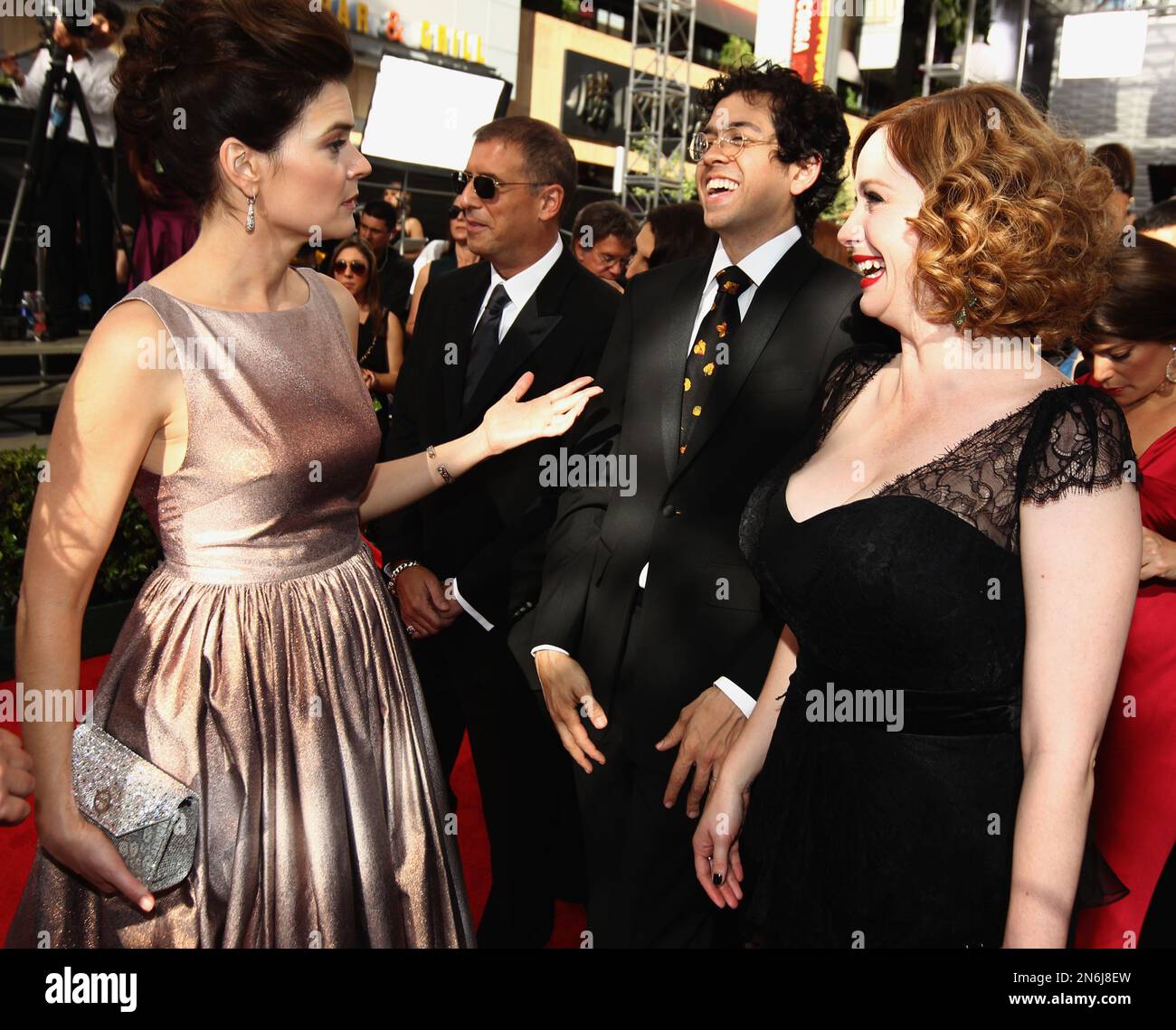 Betsy Brandt, Geoffrey Arend and Christina Hendricks talk as they ...