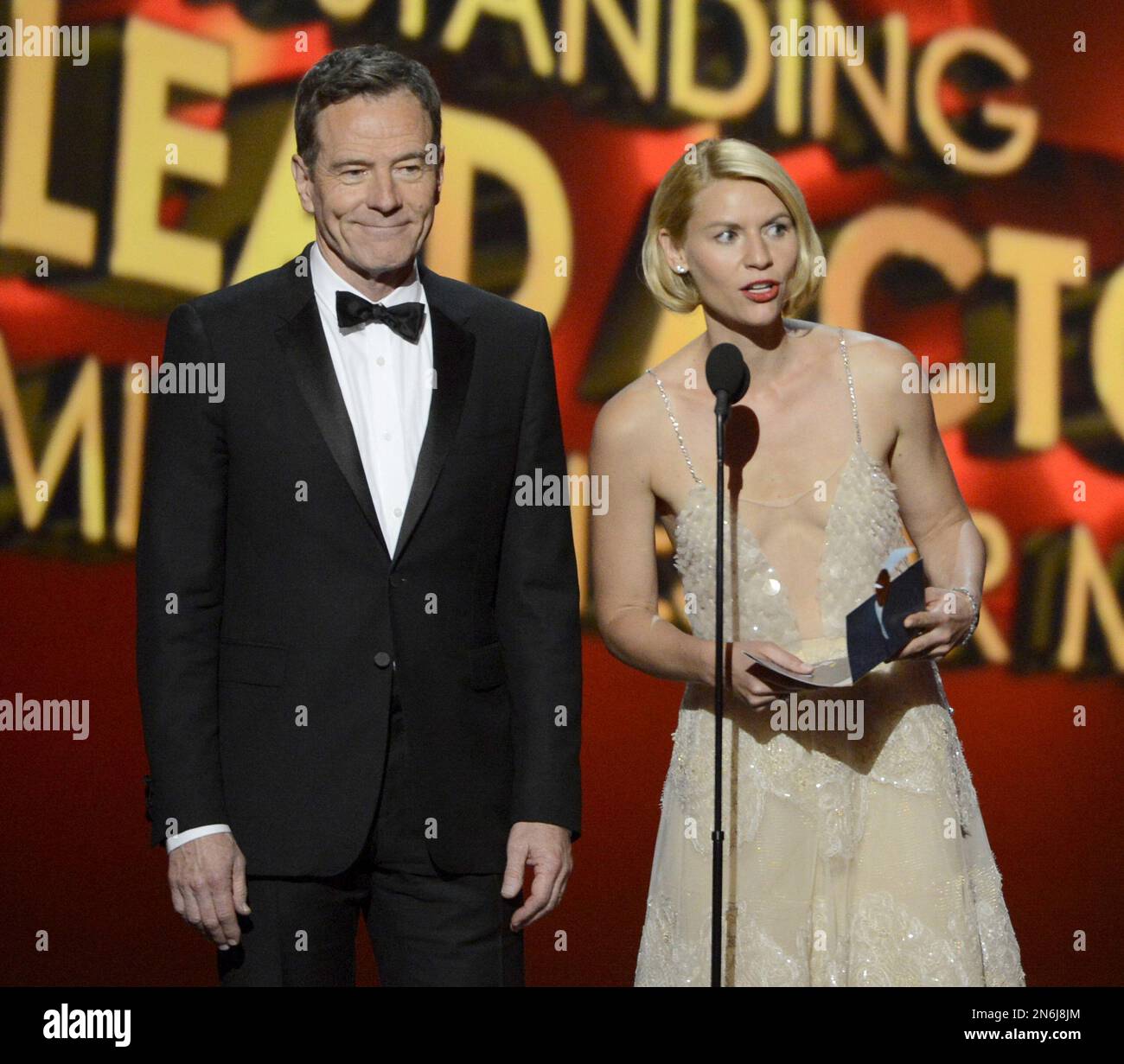 From left, presenters Bryan Cranston and Claire Danes speak onstage at ...