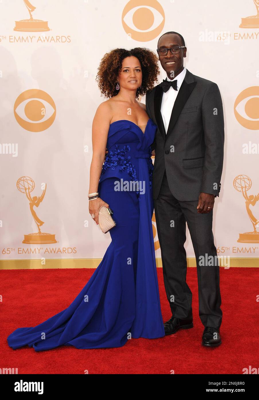 From left, Bridgid Coulter and Don Cheadle arrive at the 65th Primetime ...