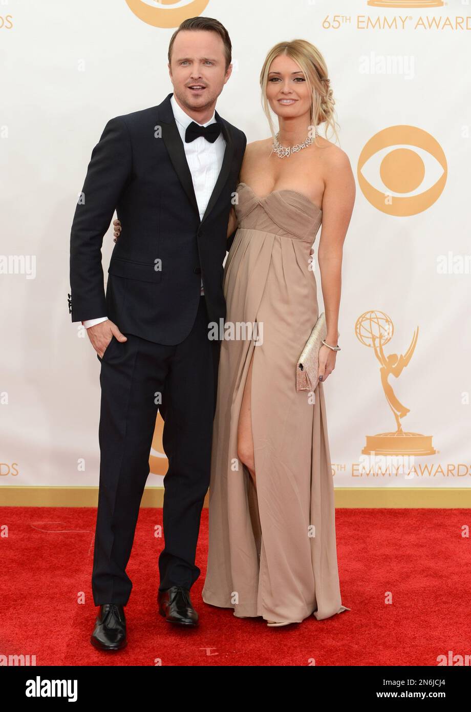 From left, Aaron Paul and wife Lauren Parsekian arrive at the 65th ...