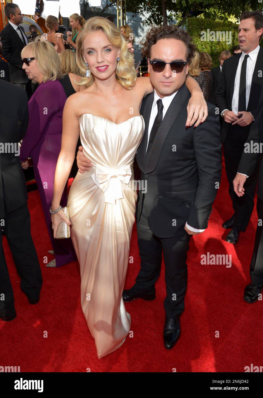 From left, Kelli Garner and Johnny Galecki arrive at the 65th Primetime ...
