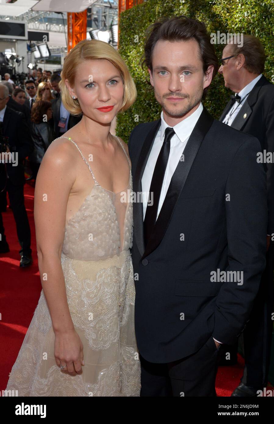 From left, Claire Danes and Hugh Dancy arrive at the 65th Primetime ...