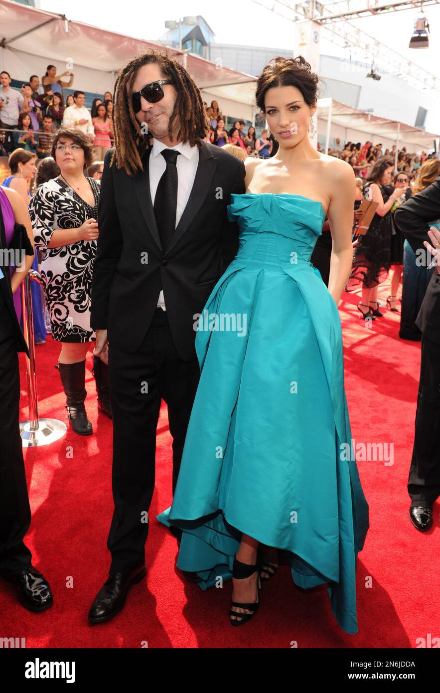 From left, John Kastner and Jessica Pare arrive at the 65th Primetime ...