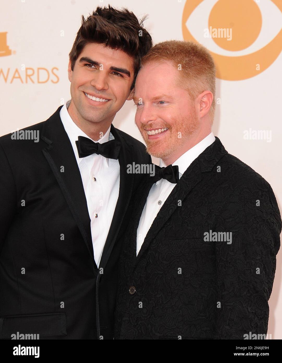 Justin Mikita and Jesse Tyler Ferguson and arrive at the 65th Primetime ...
