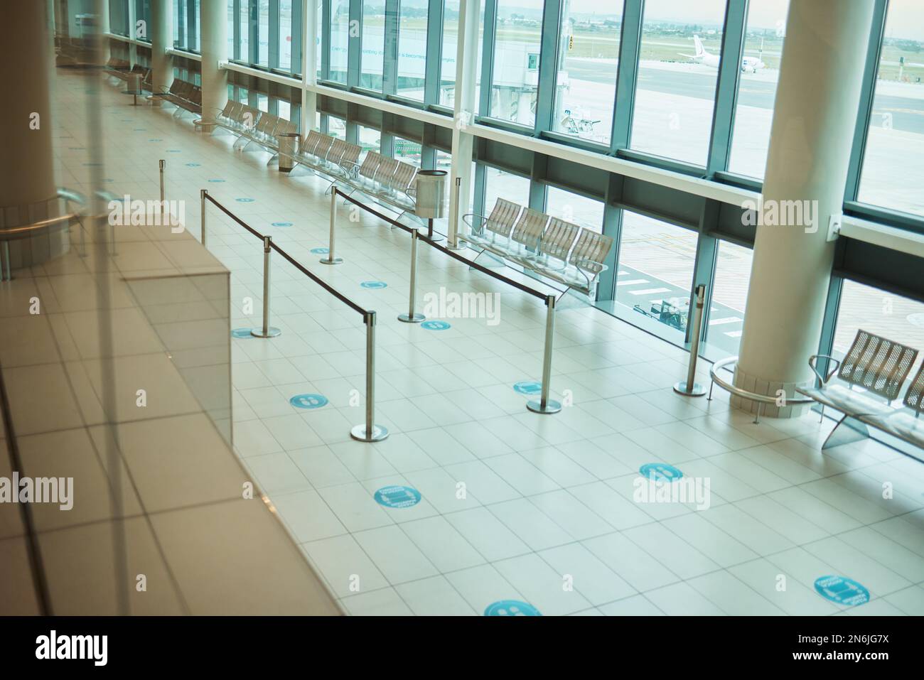 Travel, empty and floor of an airport building with space, architecture ...