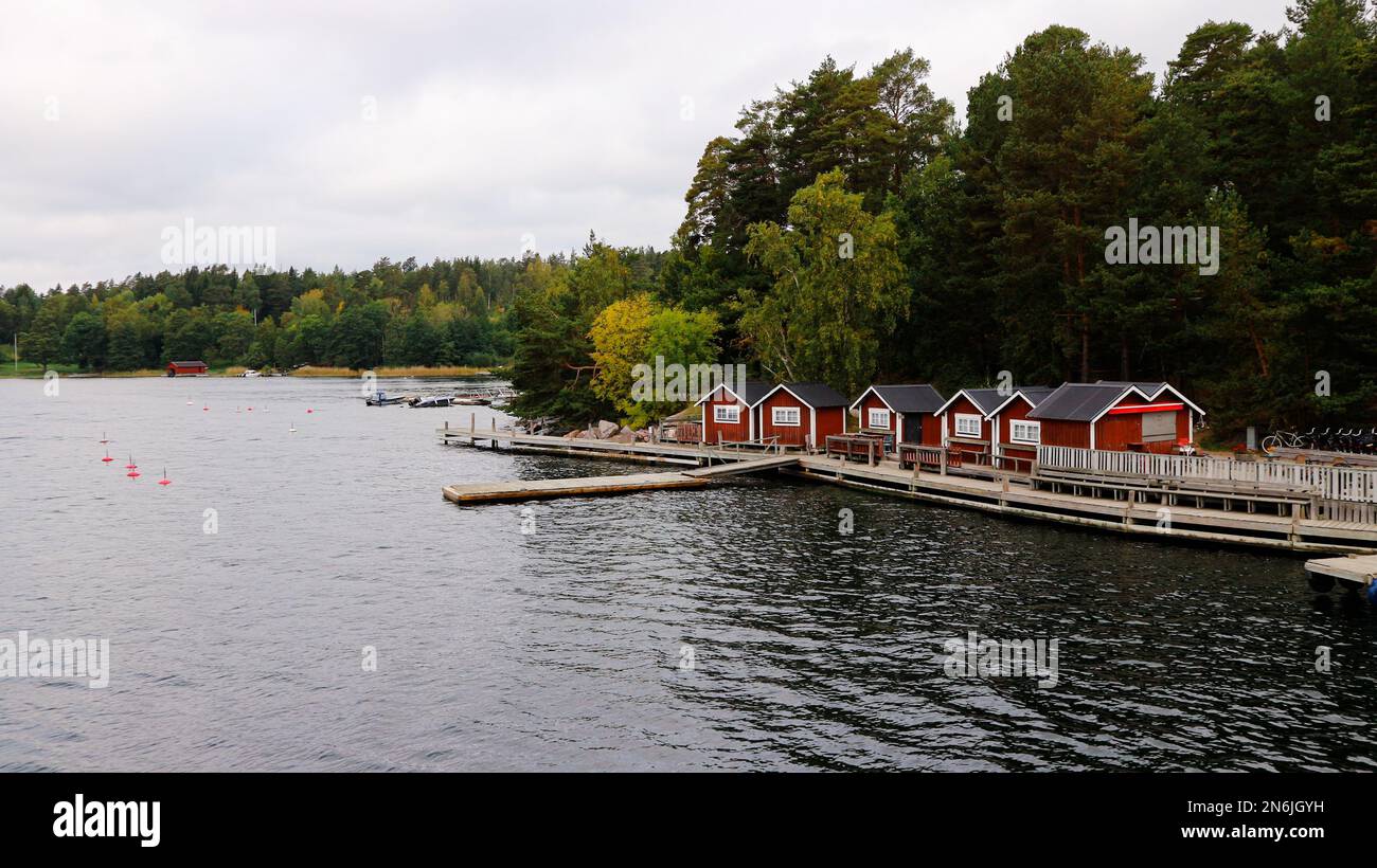 Small red buildings on island in the archipelago Stock Photo - Alamy