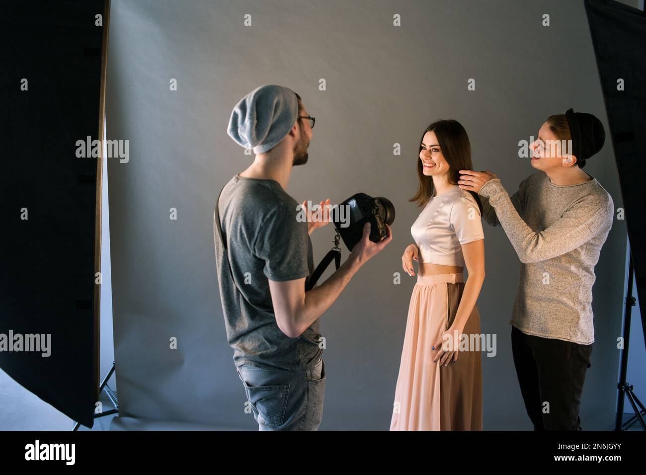 Backstage fashion model photographer communication hi-res stock ...