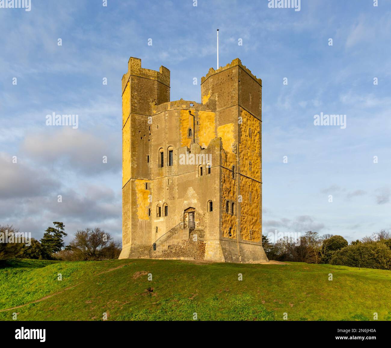 Yellow rendering on stonework conservation project, Orford Castle ...