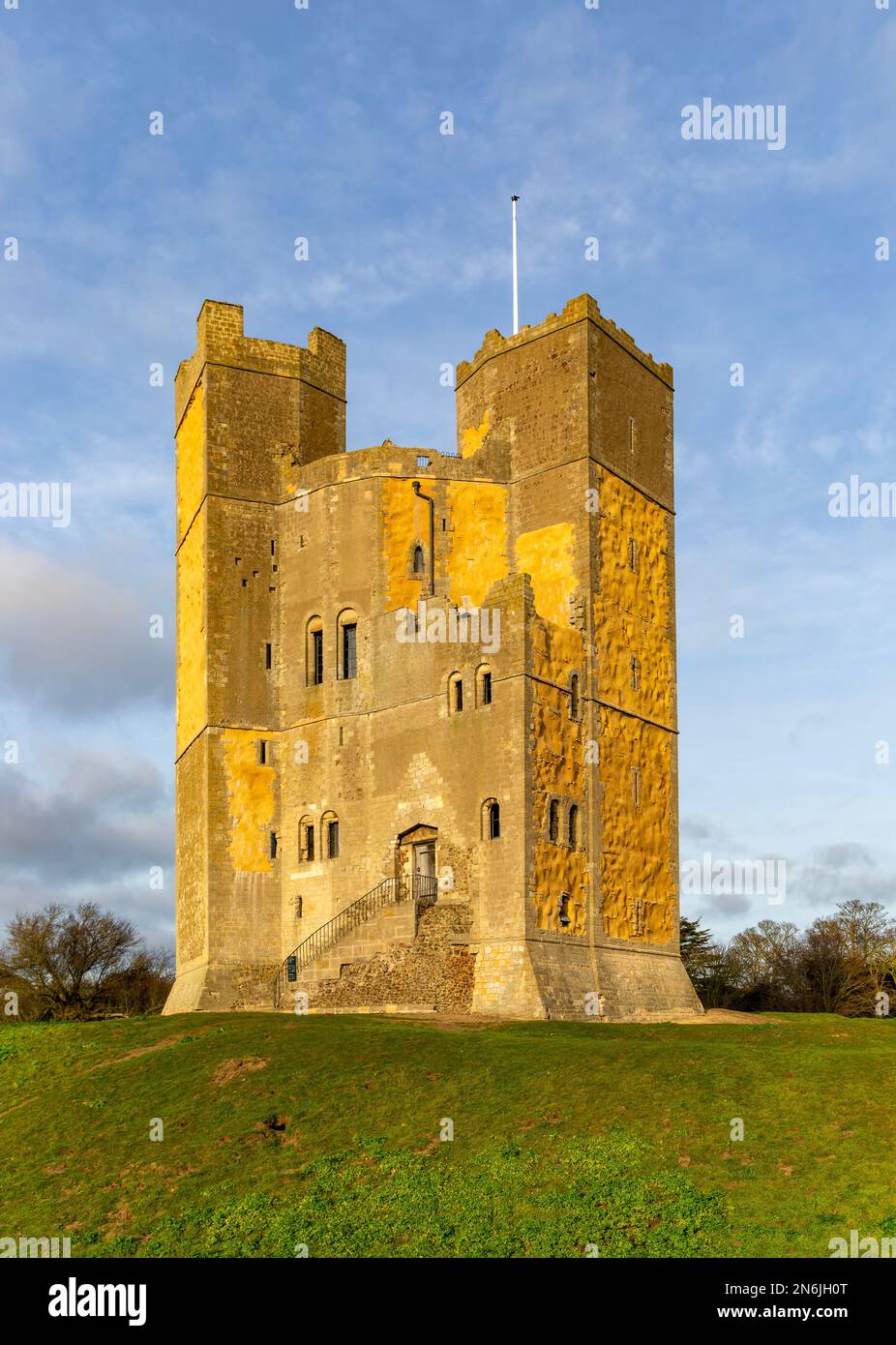 Yellow rendering on stonework conservation project, Orford Castle ...