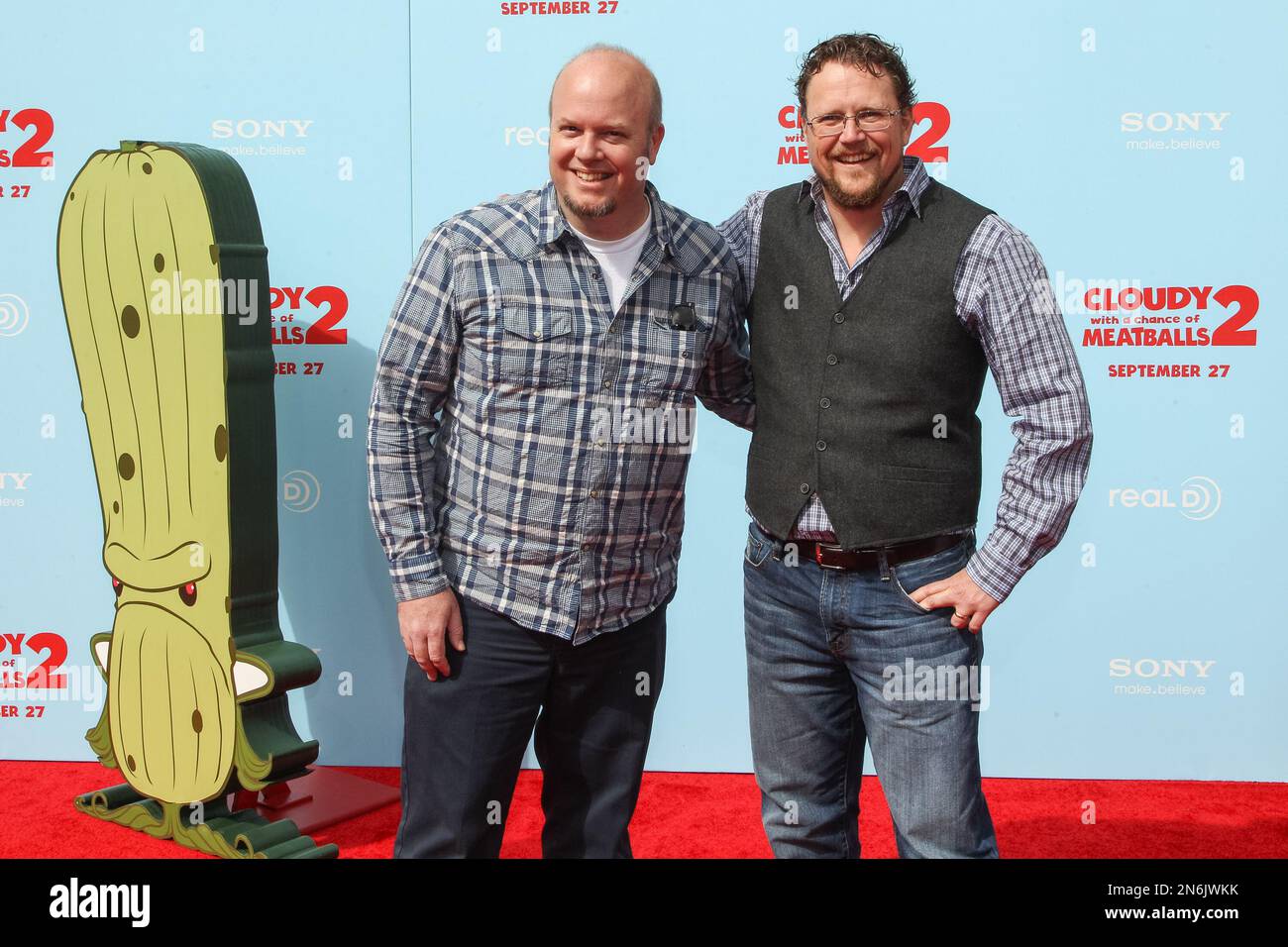 From left, directors Cody Cameron and director Kris Pearn arrive at the ...
