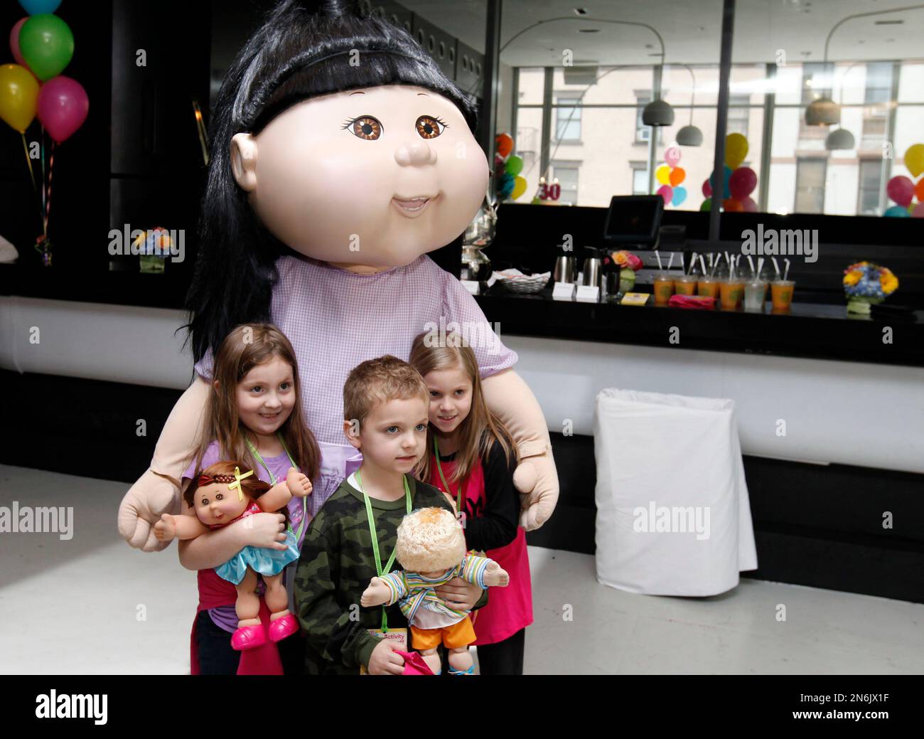 Guests interact with life-size Cabbage Patch Kid at the Cabbage Patch ...