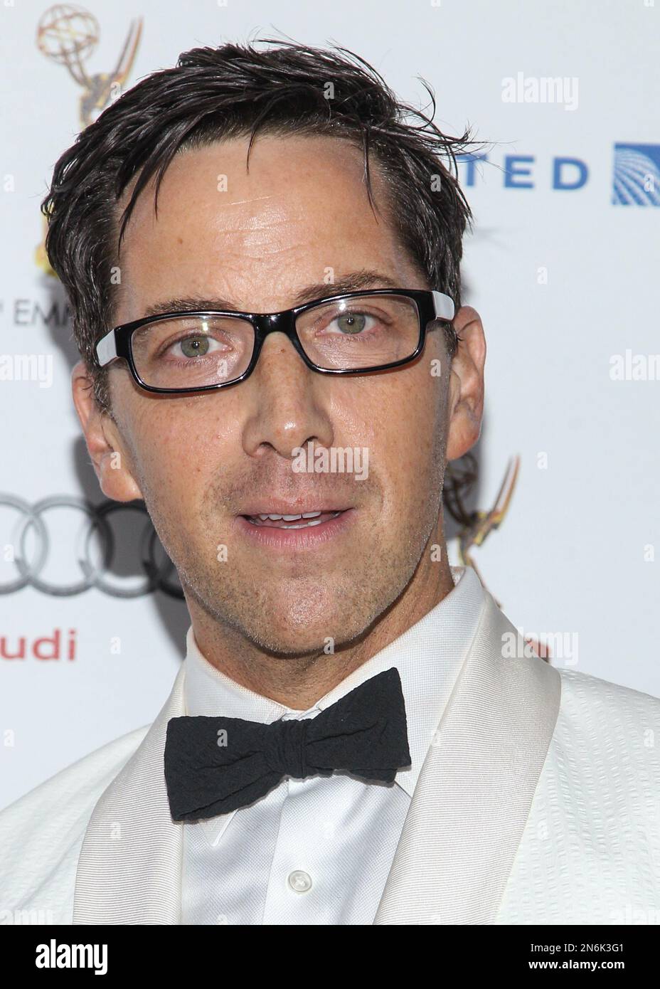 Actor Dan Bucatinsky arrives at the 65th Primetime Emmy Awards ...