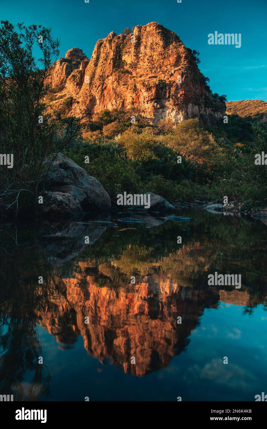 A scenic view of the Canon de la Garita reflecting on water in ...